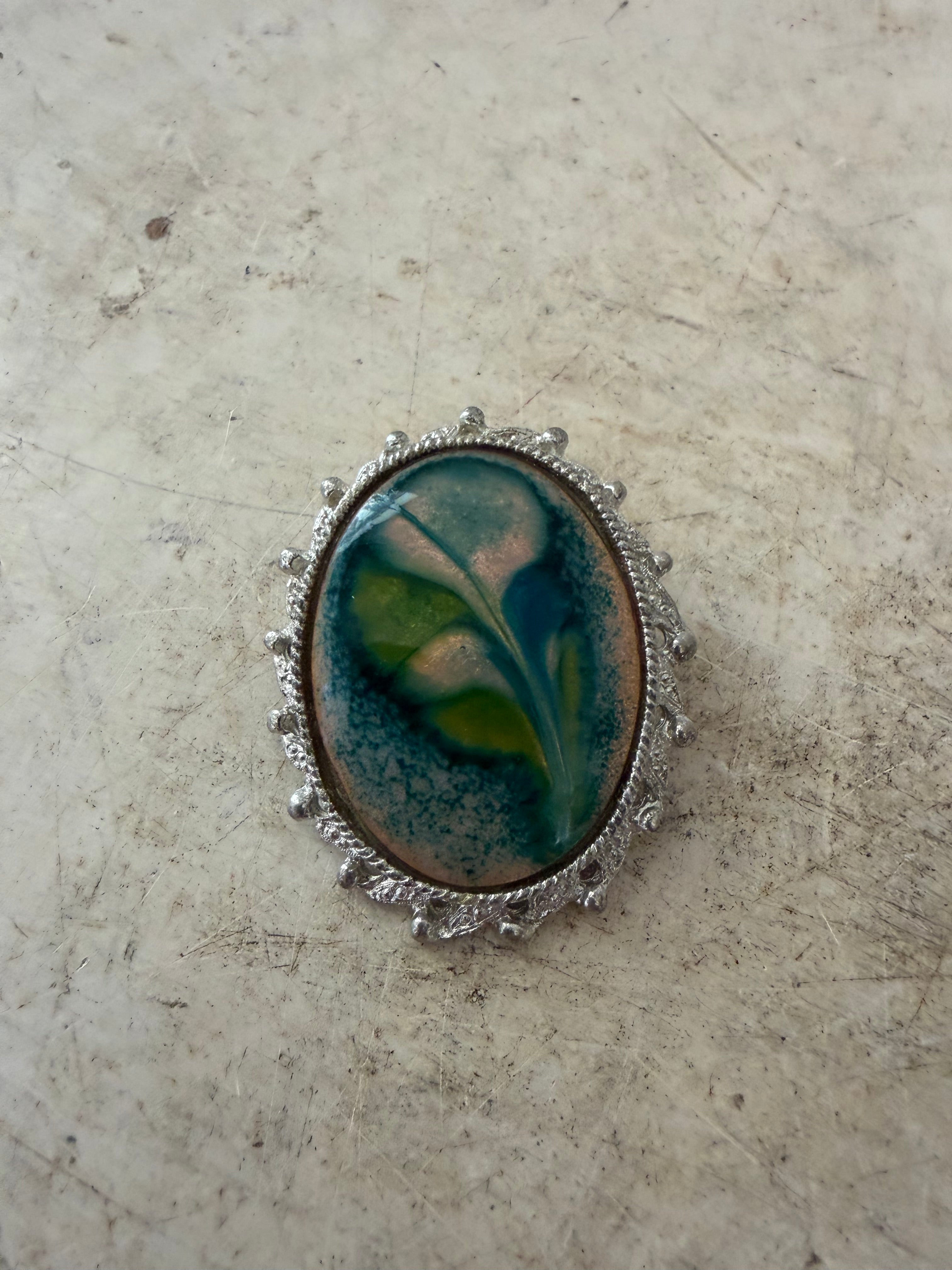 Vintage silver tone brooch with a green resin centre, unusual design ...